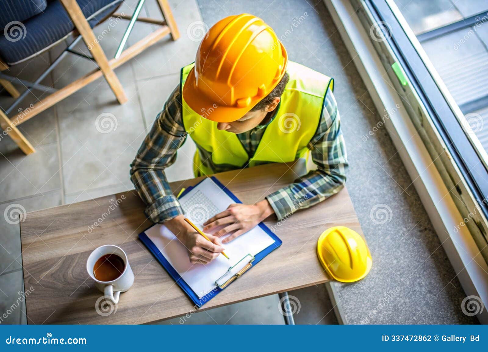 A Top View of a Trained Administrator Documenting a Job Hazard Analysis ...