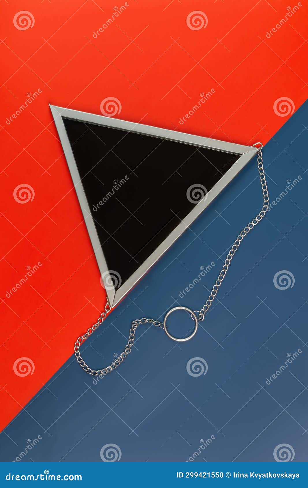 Top View of Triangle Mirror in Silver Frame on a Color Blue and Red ...