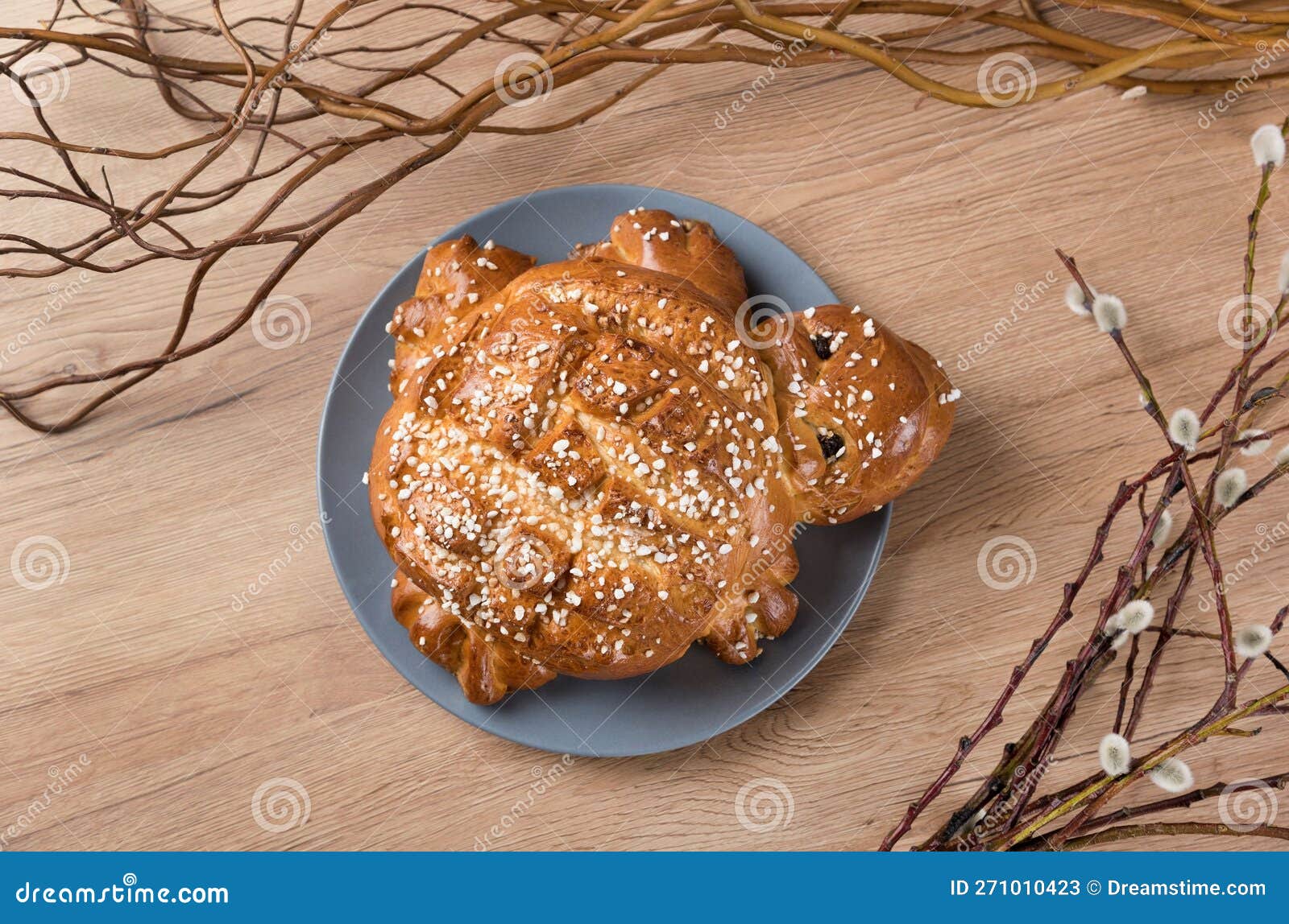 Top View of a Turtle-shaped Pastry on the Plate with Easter Decorations ...