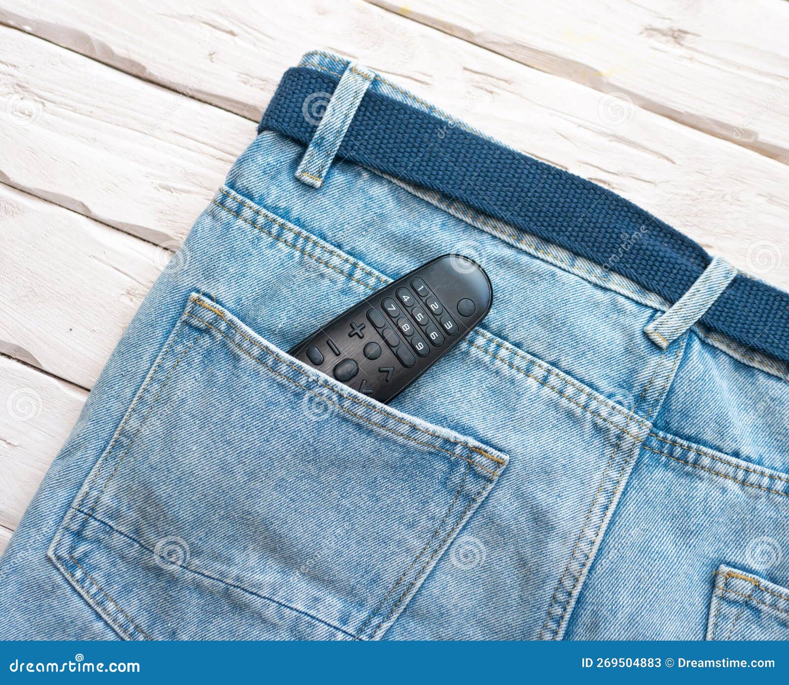 Top View TV Remote in Jeans Pocket. Remote Control Pants Pocket Stock ...