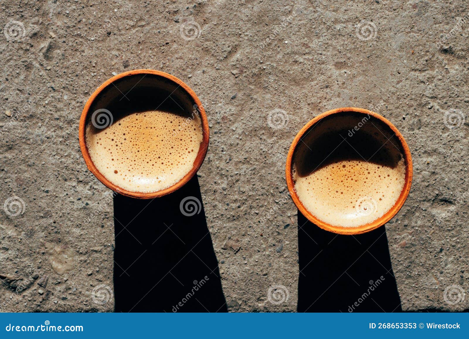 Top View of Two Cups of Foamy Coffee on Stone Surface Under Sunlight ...