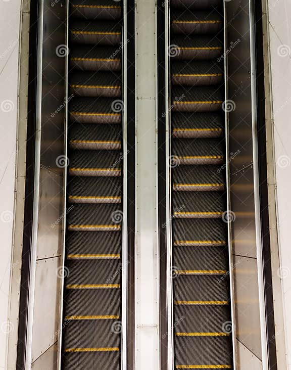 Top view of two escalators stock photo. Image of business - 306650930