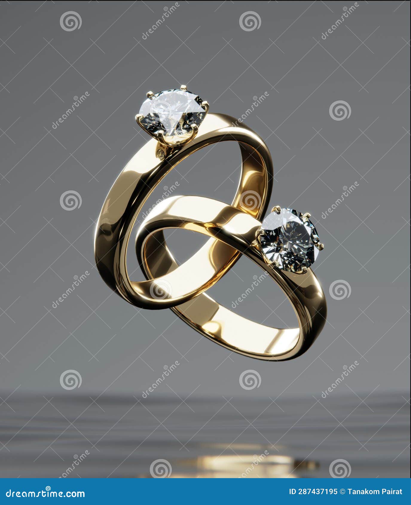 Top View of Two Gold Diamond Rings with Different Sizes of Diamonds on ...