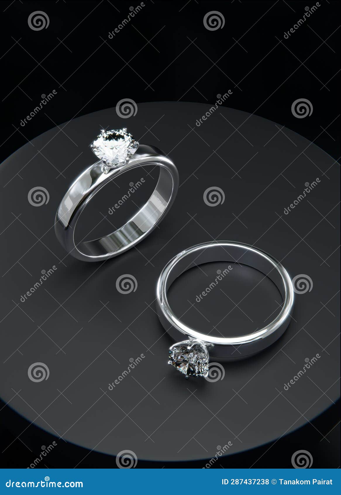 Top View of Two Gold Diamond Rings with Different Sizes of Diamonds on ...
