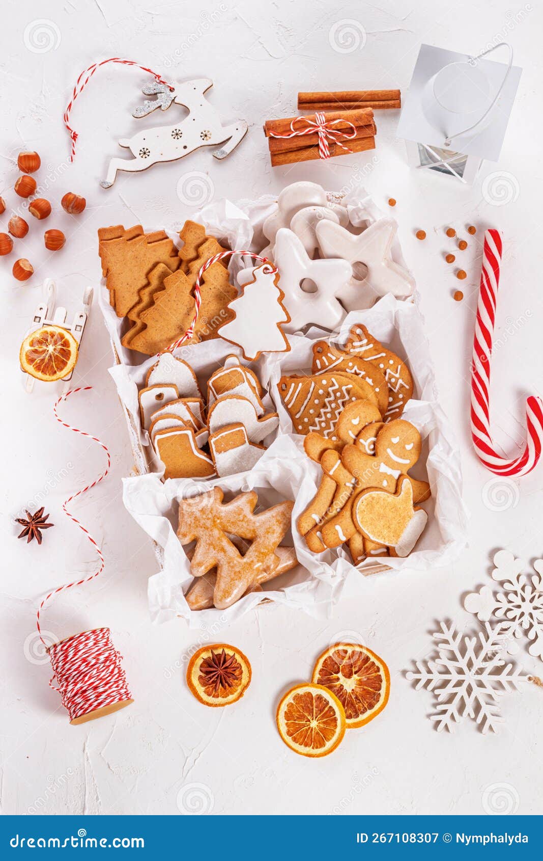 Top View of Unpacked Christmas Present with Sweets on a White Textured ...