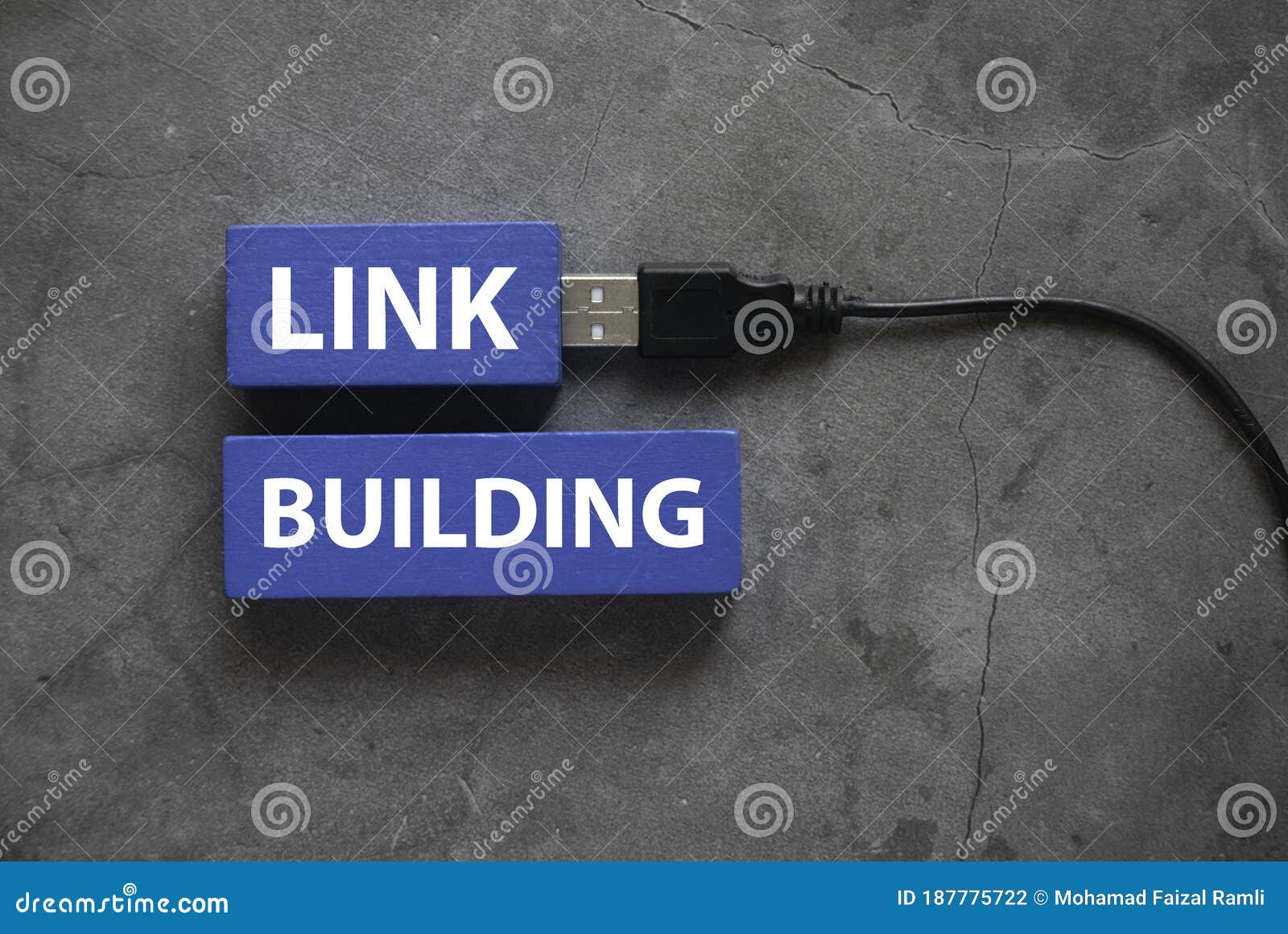 Top View of a Usb Cable and Blue Wooden Cube Written with Link Building ...