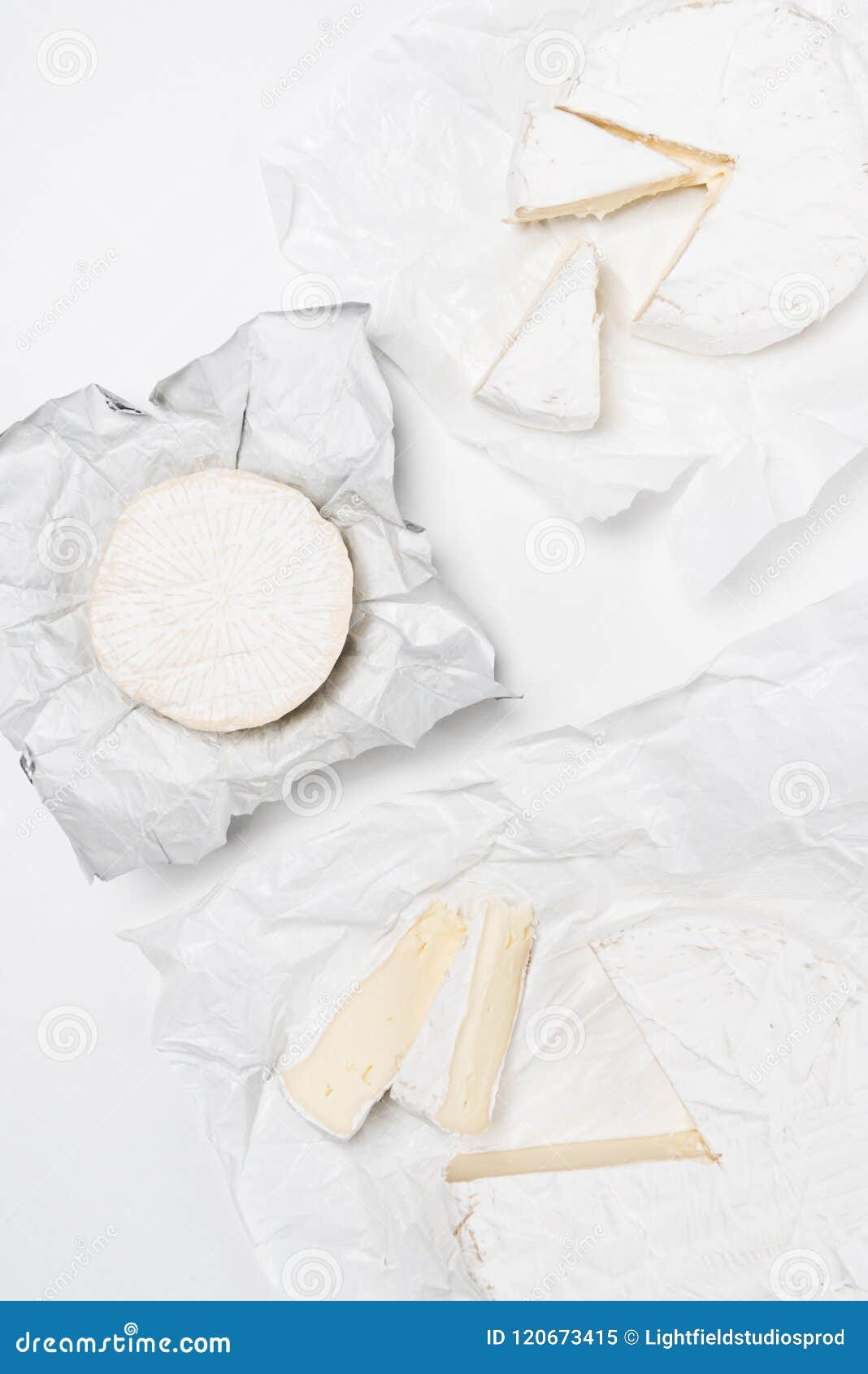 Top View of Various Brie Cheese Heads on Crumpled Paper and Stock Image ...