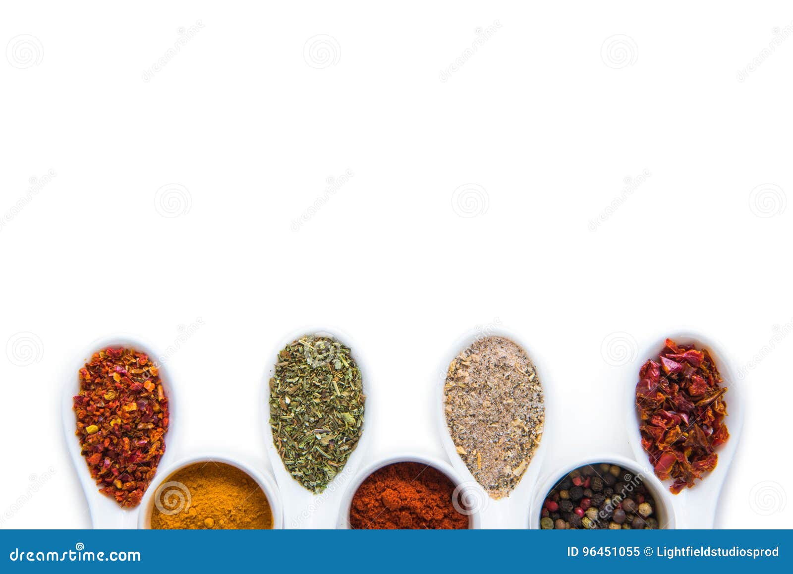 Top View of Various Dried Seasonings in White Ceramic Spoons Stock ...