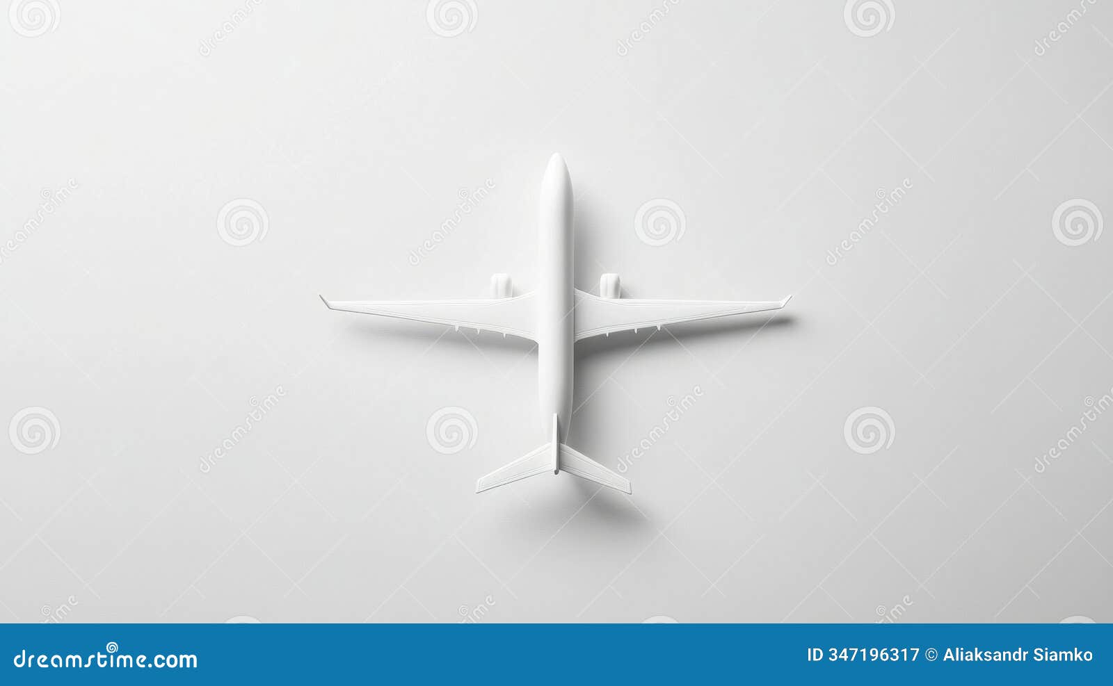 Top View of White Airplane Model on Pristine White Surface for ...