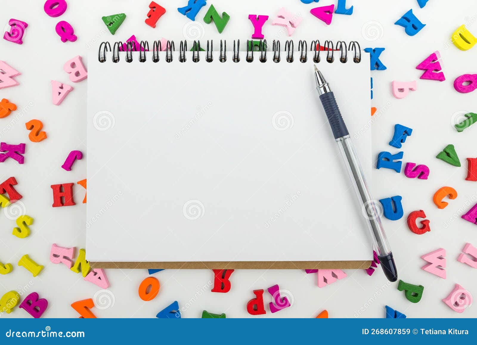 Top View of a White Blank Notepad with a Pen and Colored English ...