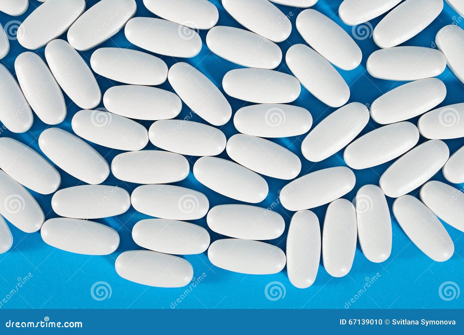 Top View of White Pills on a Blue Stock Photo - Image of pharmacy ...