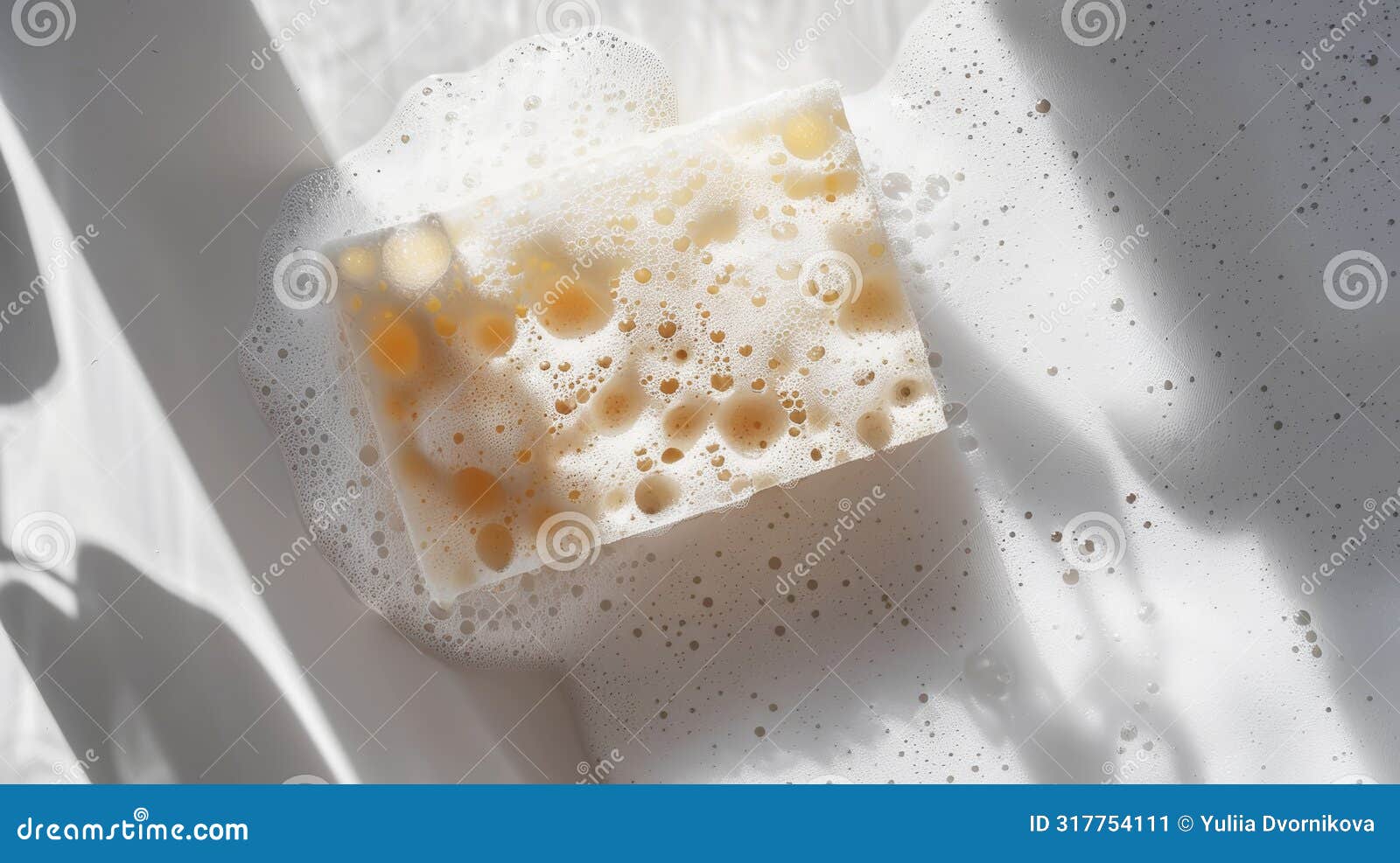 Top View of White Sponge with Soft Soap Foam on Light Kitchen Backdrop ...