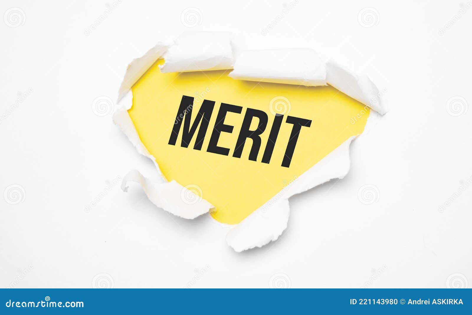 Top View of White Torn Paper and the Text Merit on a Yellow Background ...