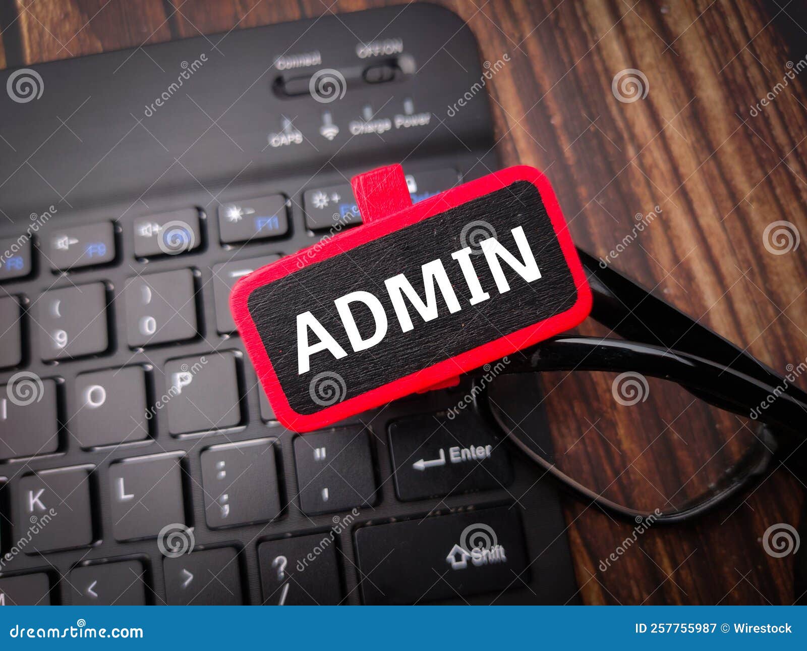 Top View of a Wireless Keyboard and Glasses with the Word ADMIN on ...