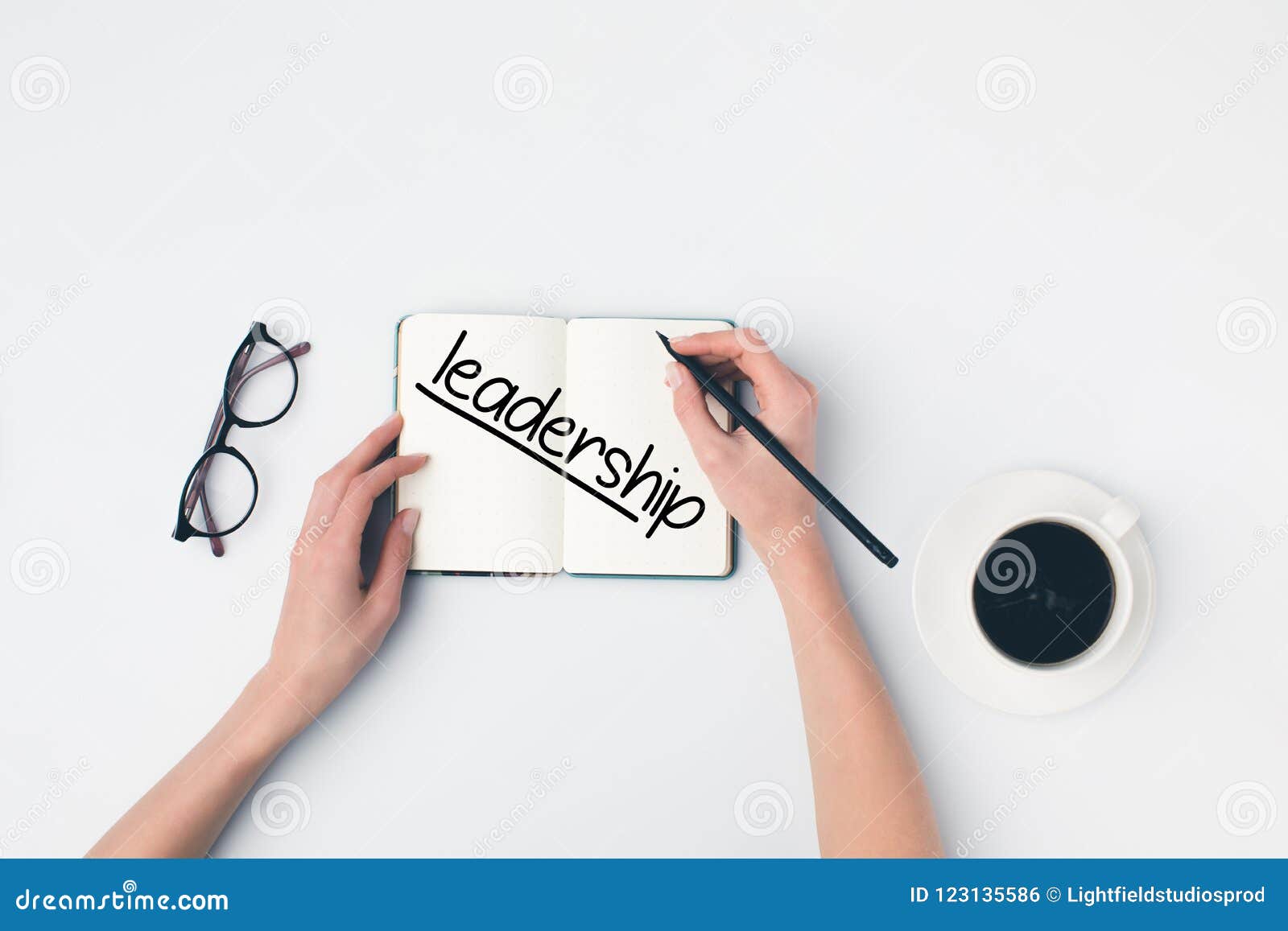 Writing Leadership in Notebook Stock Photo - Image of eyeglasses ...