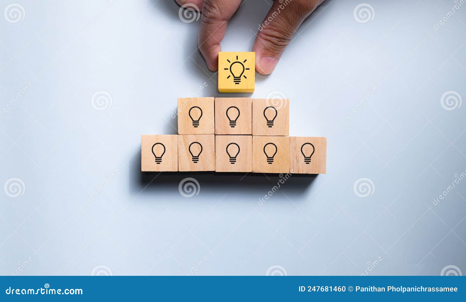 Top View Wooden Blocks with Light Bulb in Pyramid. Stock Photo - Image ...