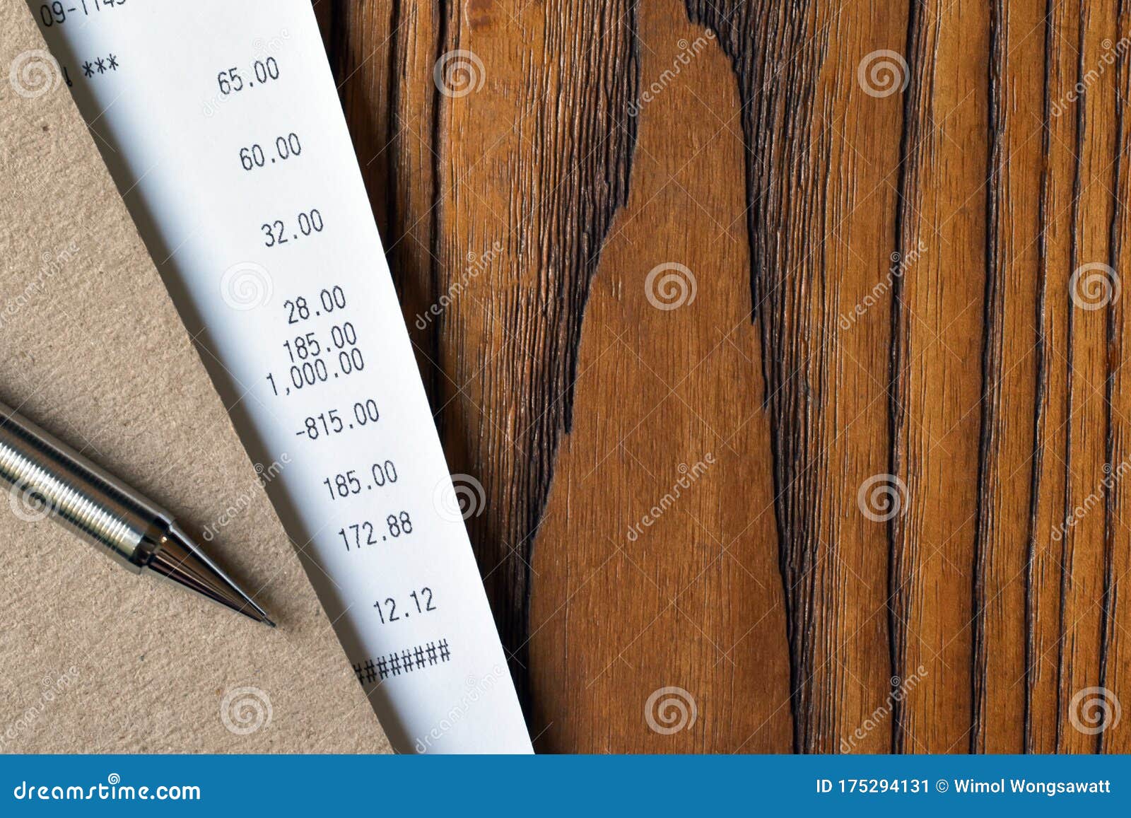 Top View Wooden Table with Brown Book and Paper Bill with Copy Space ...