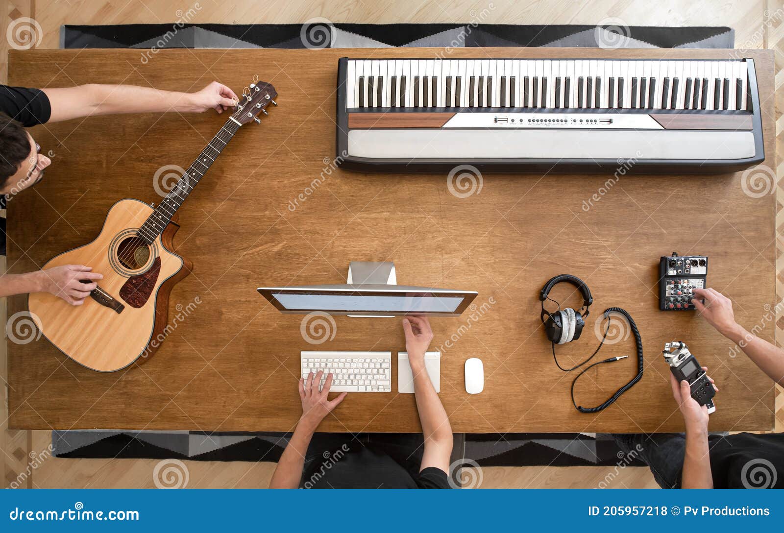 Top View of a Wooden Table with Musical Instruments and a Computer ...