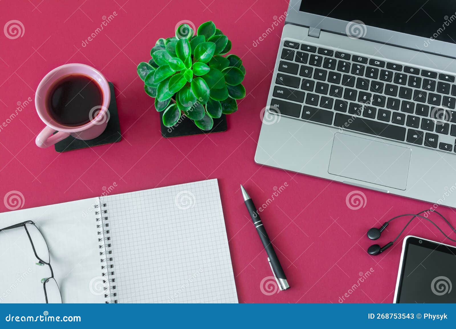 Top View of Workplace with Laptop, Notebook with Pen and Other Items on ...