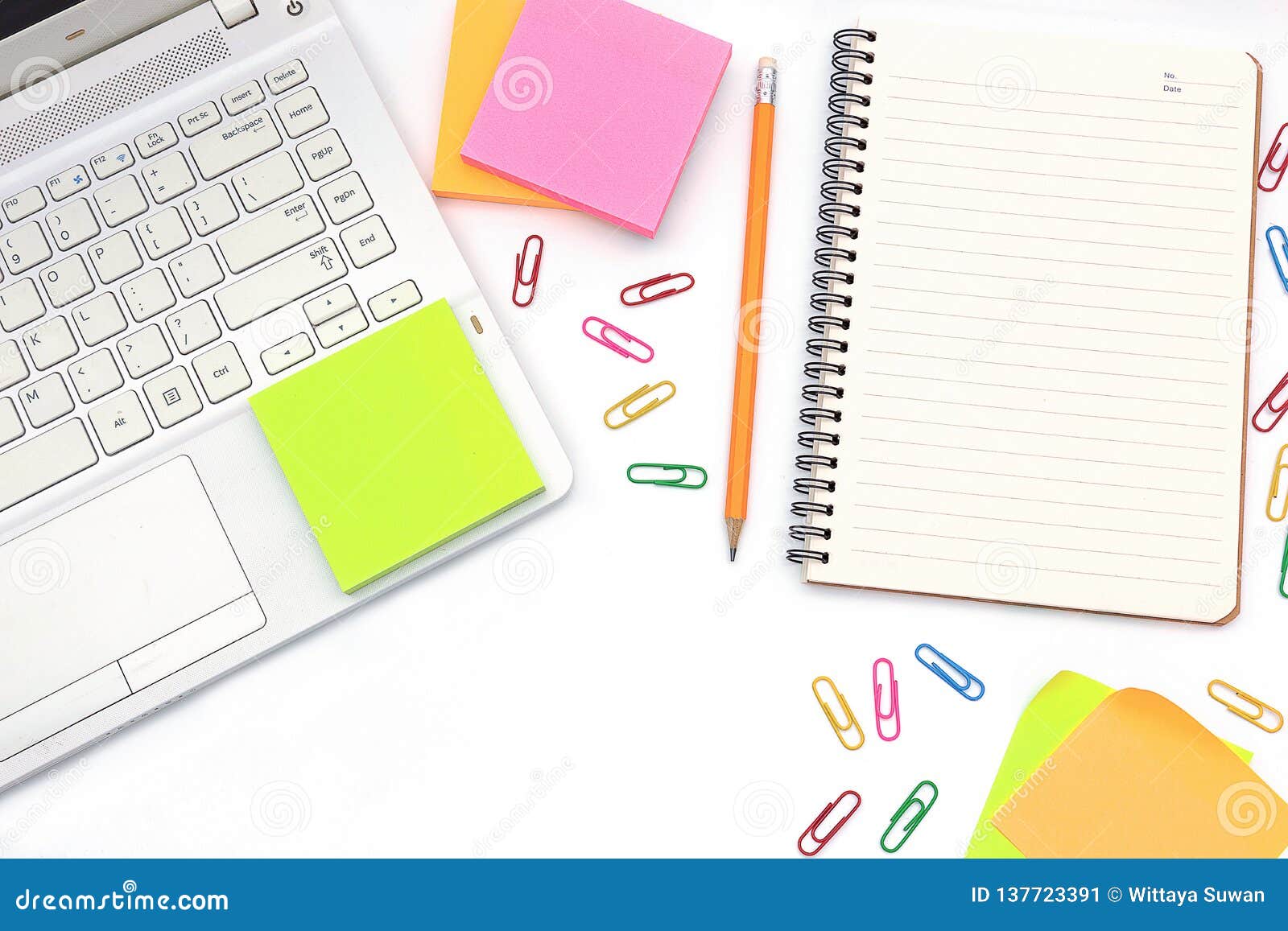 Top View Workspace Notebook Computers, Multi-colored Paper Clip, Sticky ...