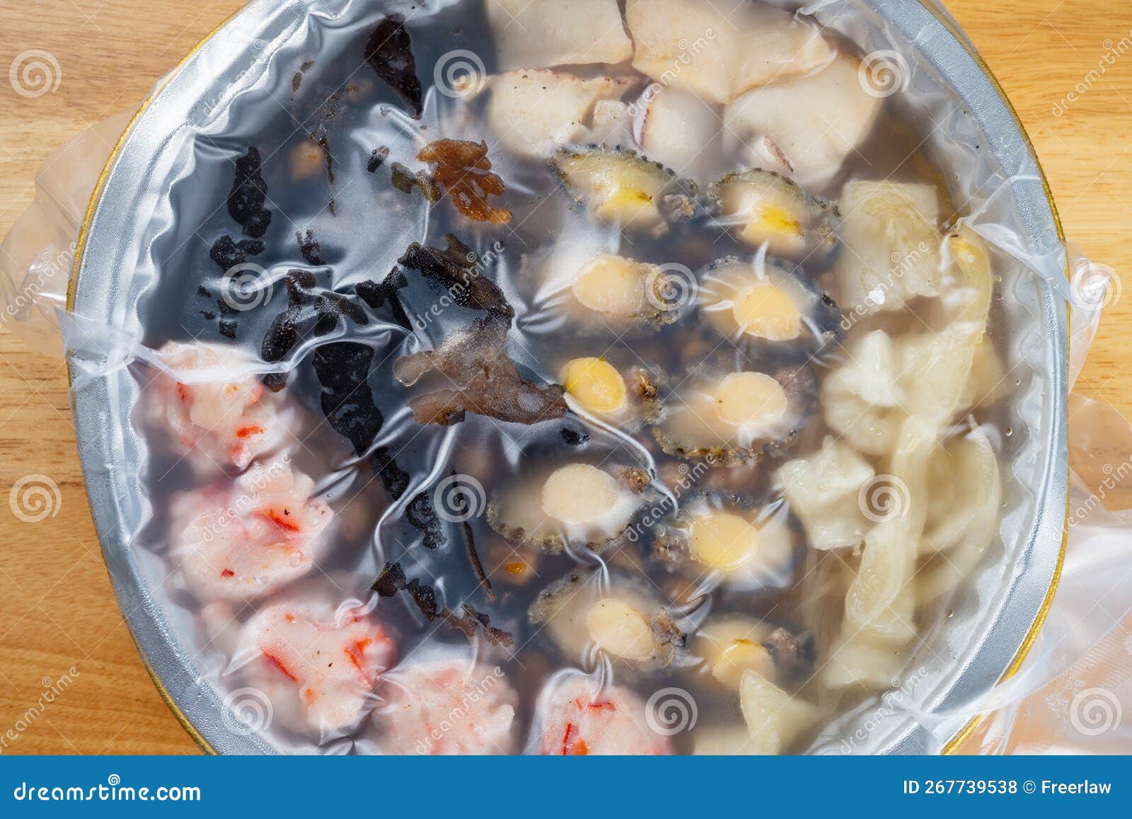 Wrapped Big Bowl Feast or Poon Choi with Different Seafood Stock Photo ...