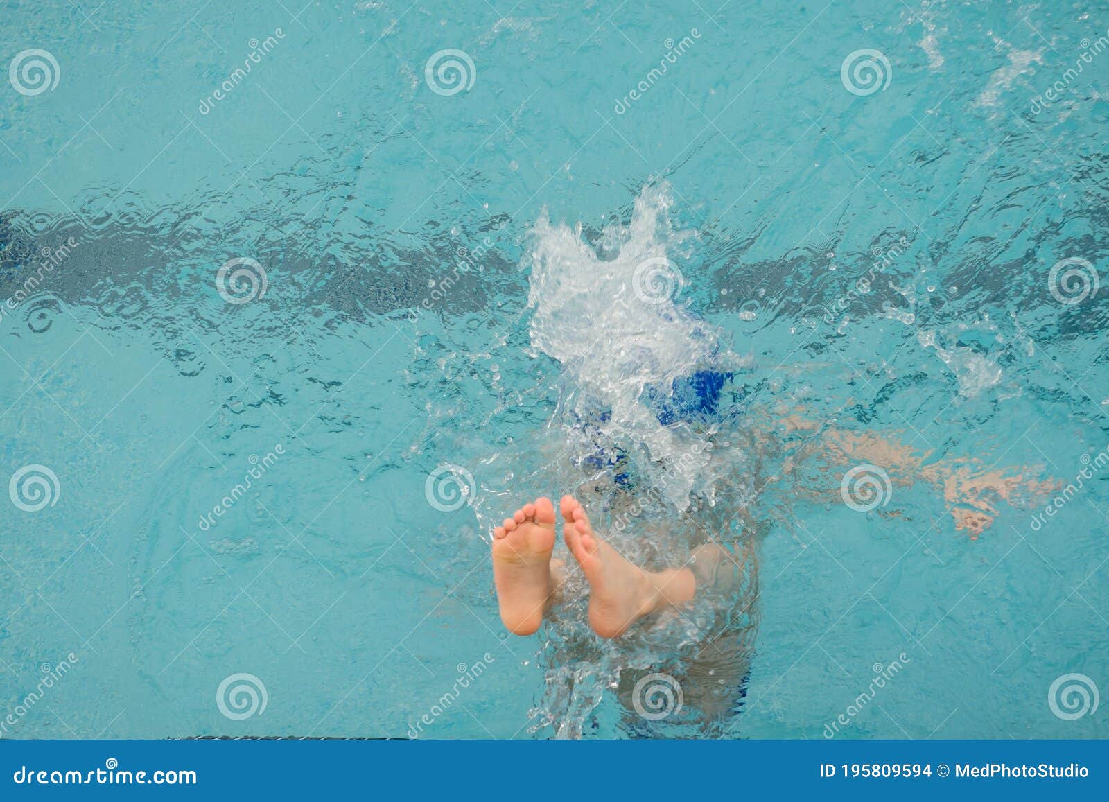 7-year Boy Swimming Backstroke in a Swimming Pool Stock Photo - Image ...