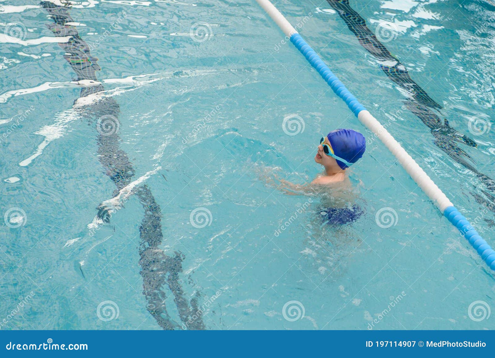 7-year Boy Swimming Backstroke in a Swimming Pool Stock Image - Image ...