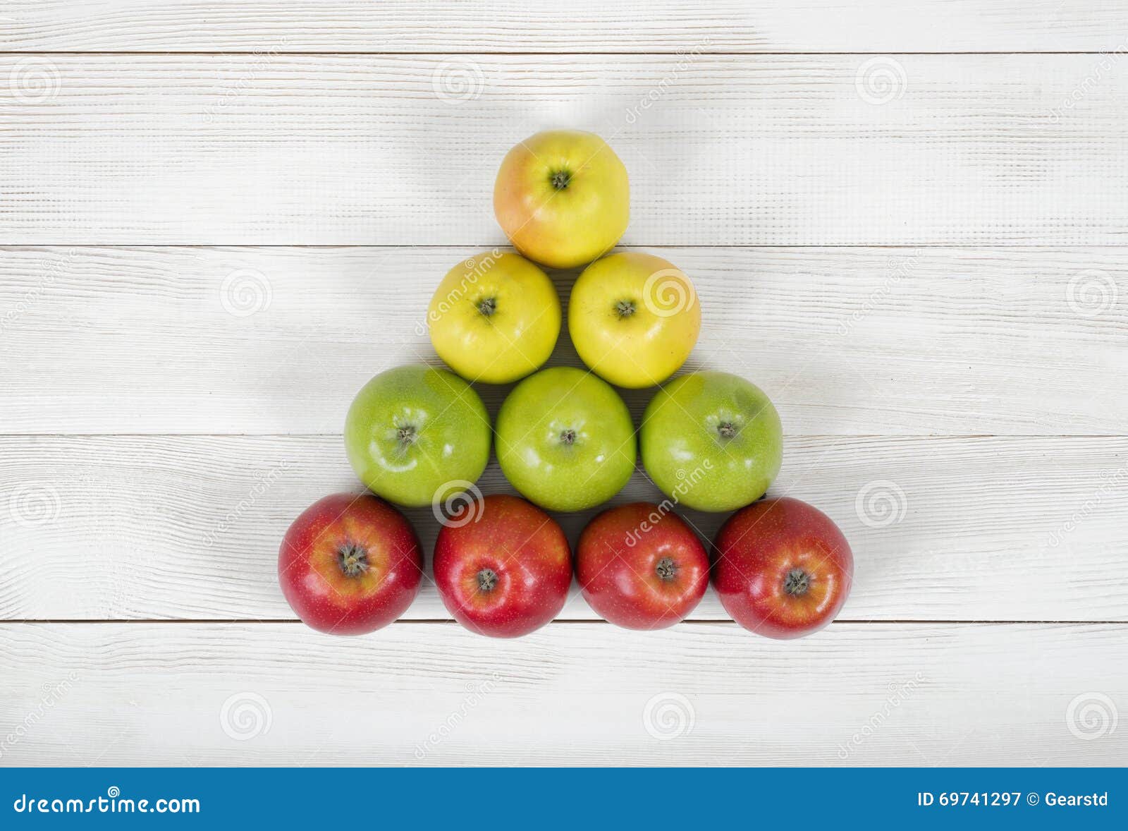 Top View of Yellow, Green and Red Apples Creating a Triangle Shape ...