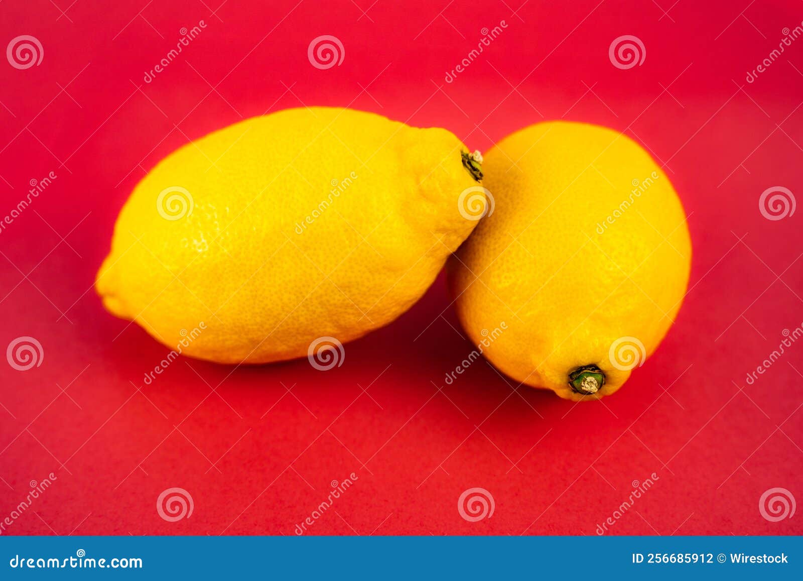 Top View of a Yellow Lemon Placed on a Red Background Stock Photo ...