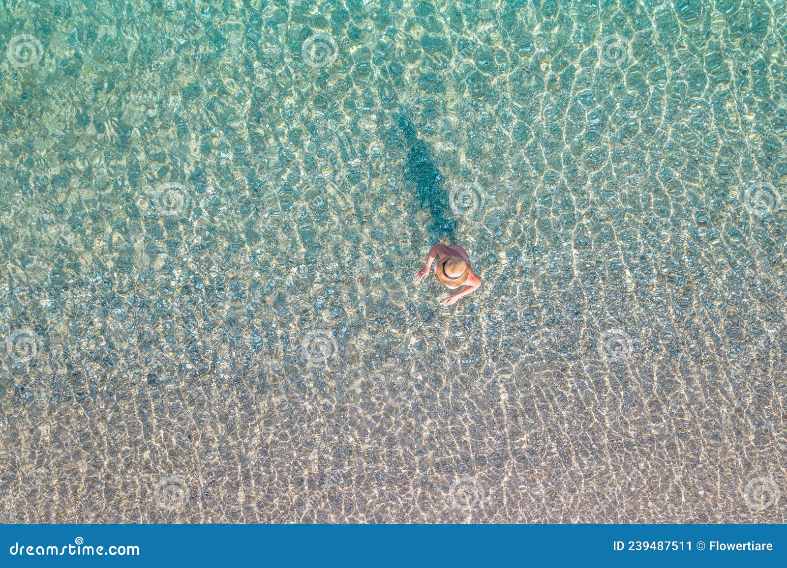 Top View Young Beautiful Naked Woman In A Hat Taking Off Bikini In Sea Water Drone Copter
