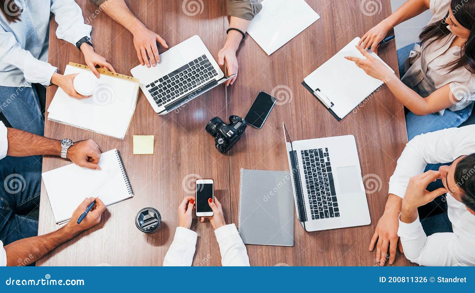 Top View of Young Business People that Working Together with Documents ...