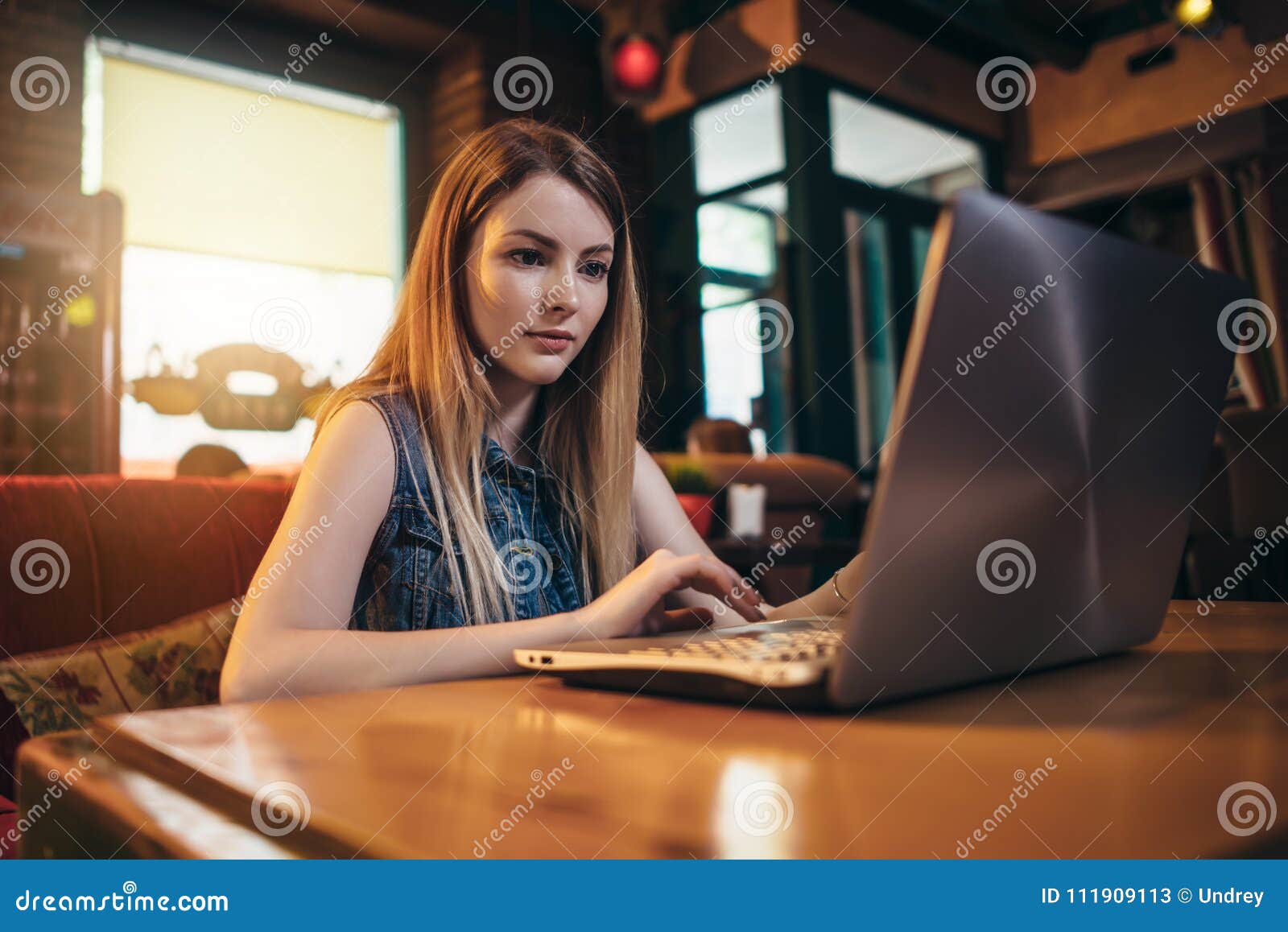 Top View of Young Female Student Working on Laptop Sitting at Table ...