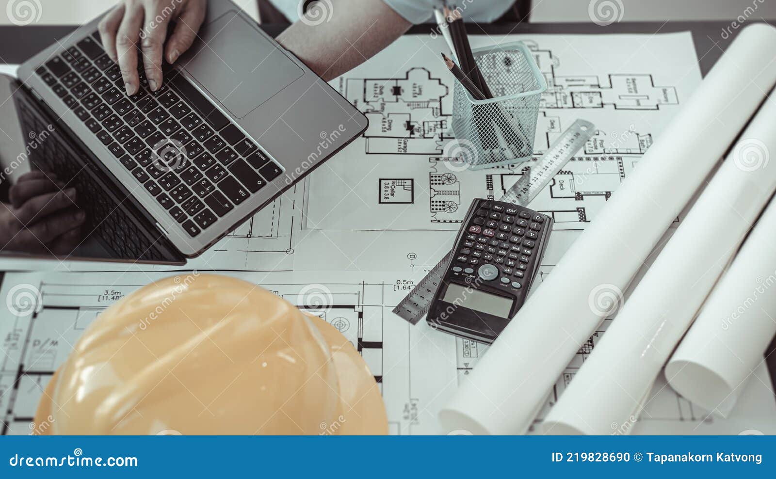 Top View, Young Man with a Laptop Plotting a System of Building ...