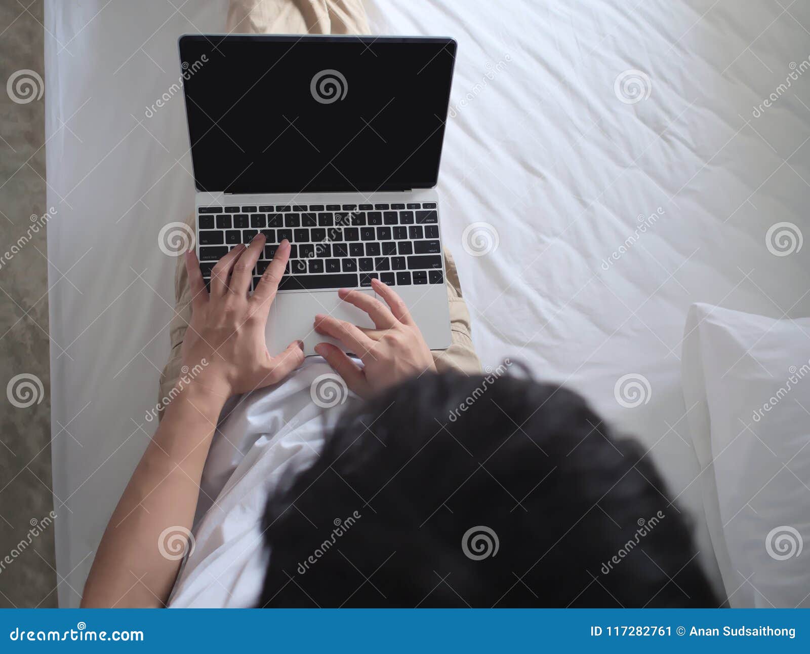 Top View of Young Man Using Computer Laptop on the Bed in Bedroom ...