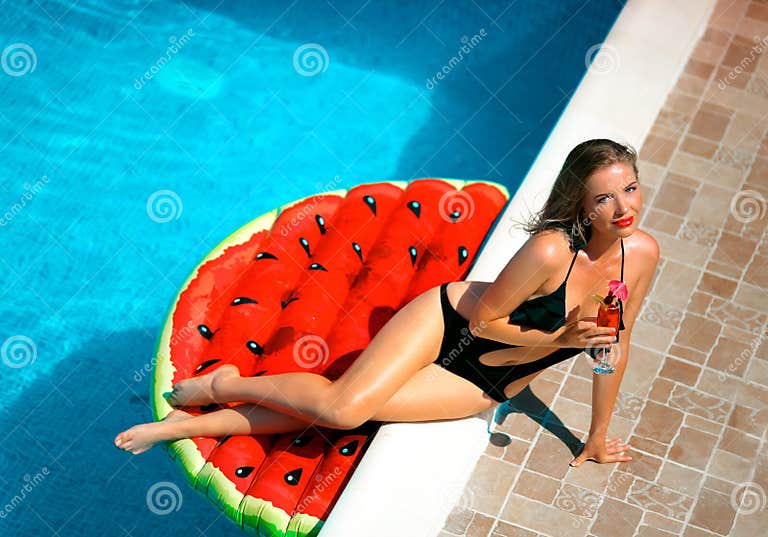Top View Of Young Woman Drink Coctail On Watermelon Lilo Fun Girl