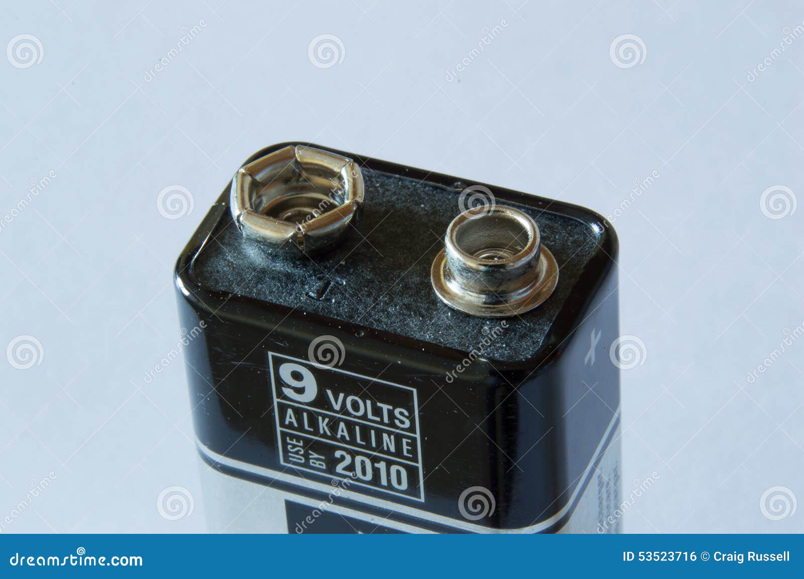 Top of a 9 volt battery stock photo. Image of alkaline - 53523716