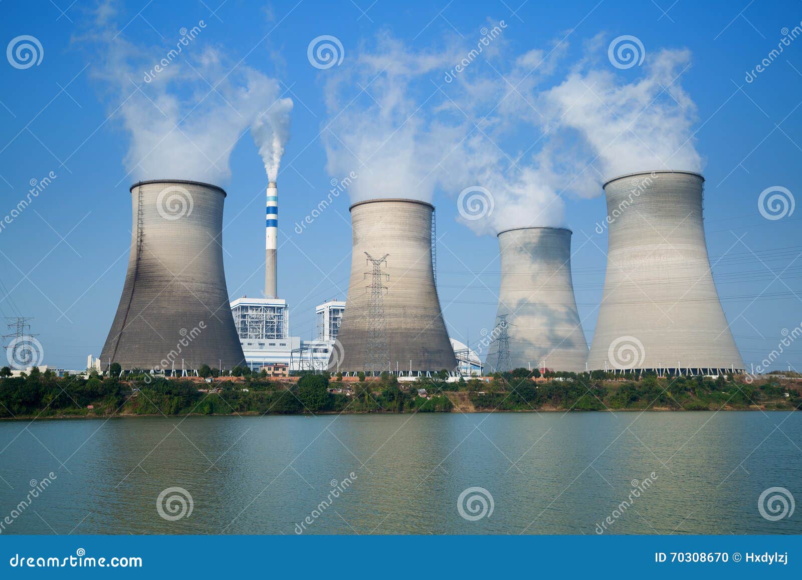 Tops of Cooling Towers of Atomic Power Plant Under Blue Sky Stock Photo ...