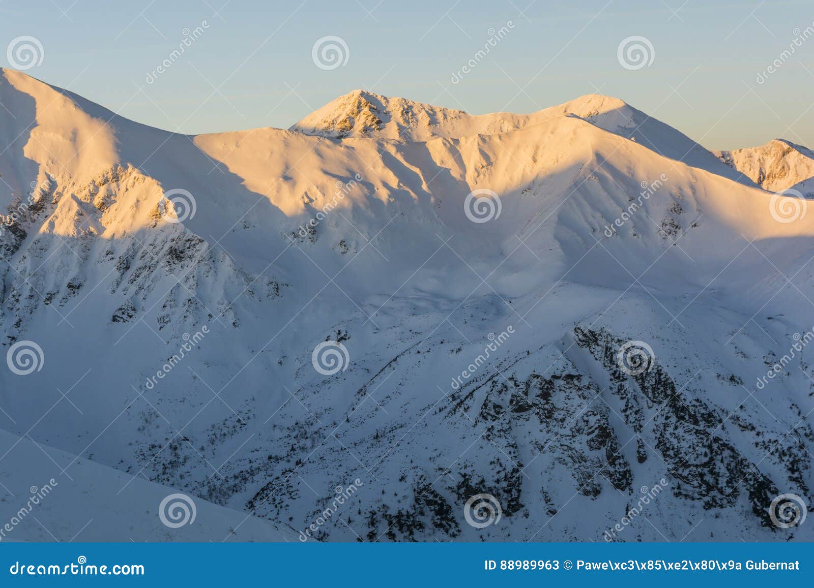 The Tops of the Peaks in the Rays of the Rising Sun. Stock Image ...