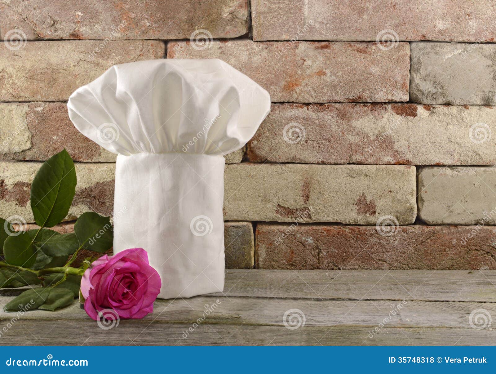 Toque with Pink Rose on Brick Wall Stock Photo - Image of chef, concept ...