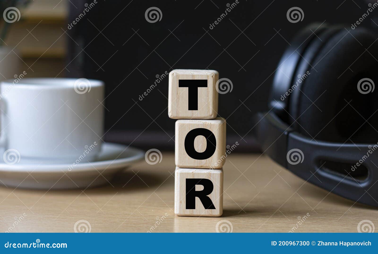 TOR -word on Cubes on the Background of the Tablet, Headphones and a ...