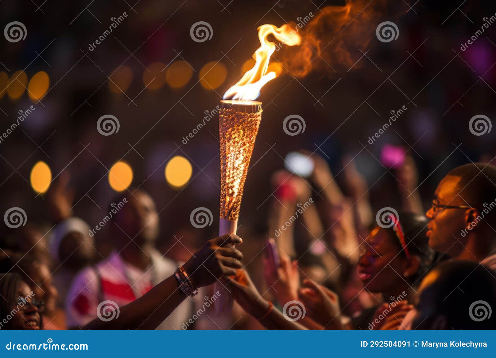 Torch with the Olympic Flame at the 2024 Olympic Games Stock ...