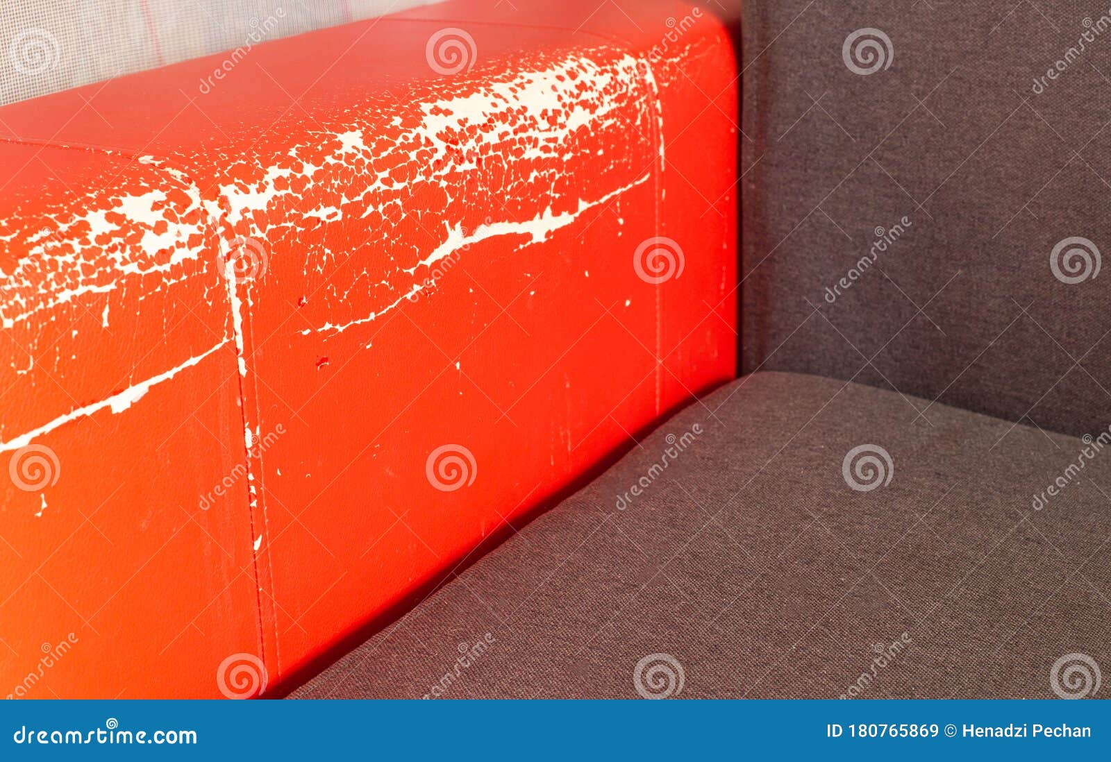 Torn and Battered Leather Back of the Sofa. Poor Quality Leather ...