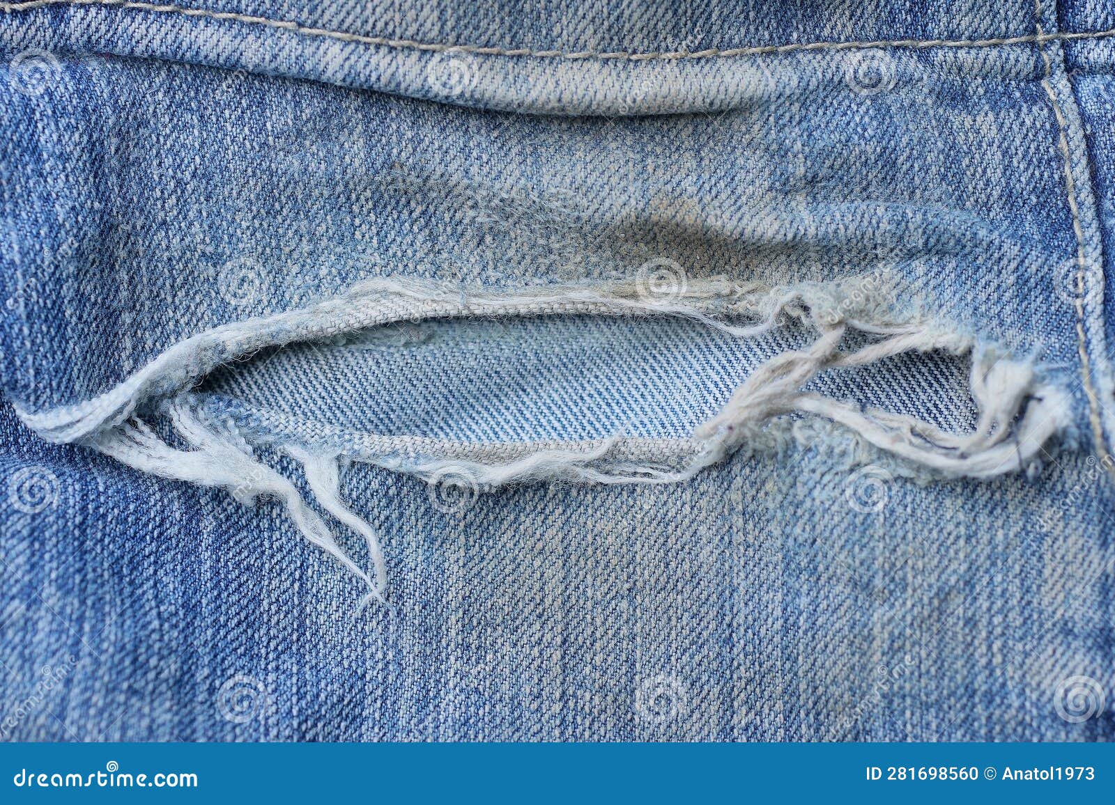 Torn Blue Cotton Fabric with White Threads on Clothes Stock Photo ...