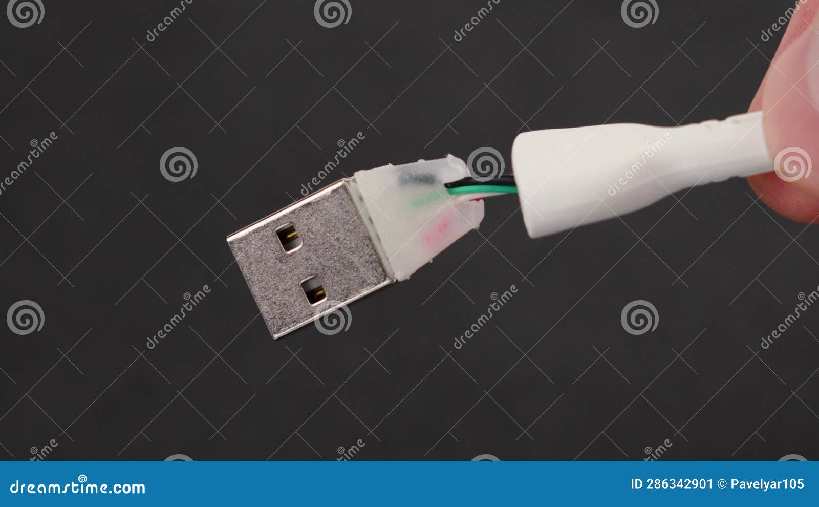 Torn Damaged Usb Cable in Hand. the Connecting Accessory of Charging is ...