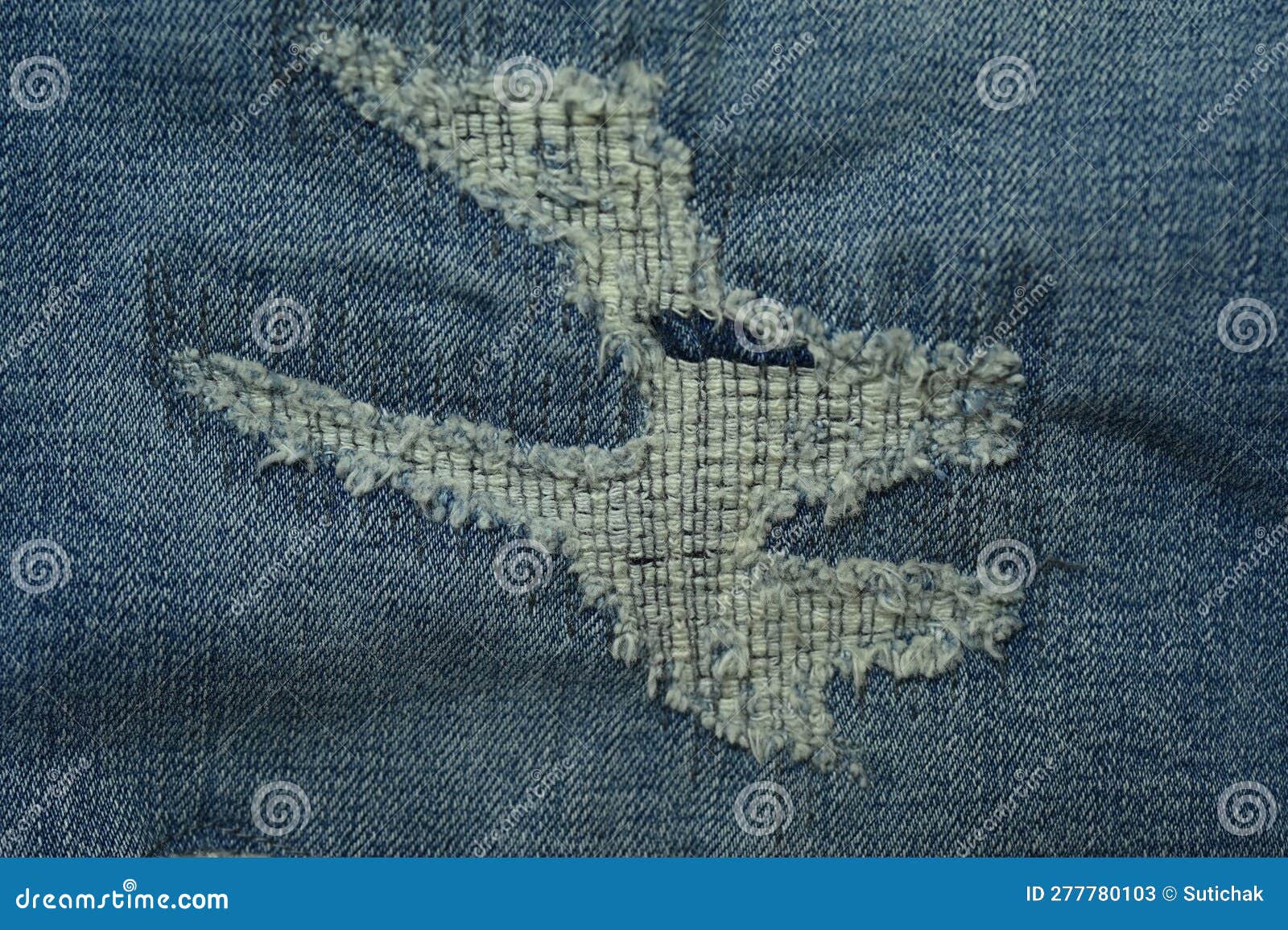 Torn on denim jean textile stock image. Image of pattern - 277780103
