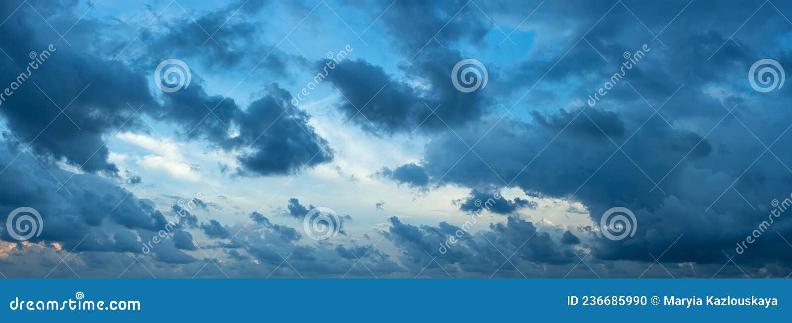 Torn Formless Dark Clouds Blown by the Strong Wind at Evening. Scenic ...