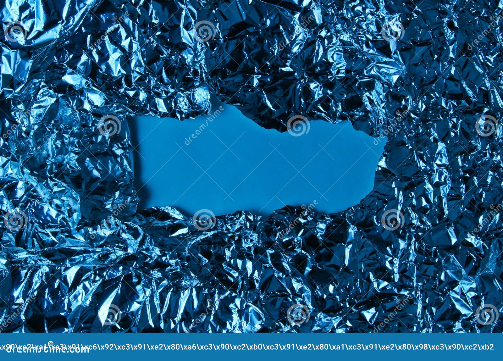 Torn Frame of Crumpled Foil with Space for Your Infirmation. Copy Space ...