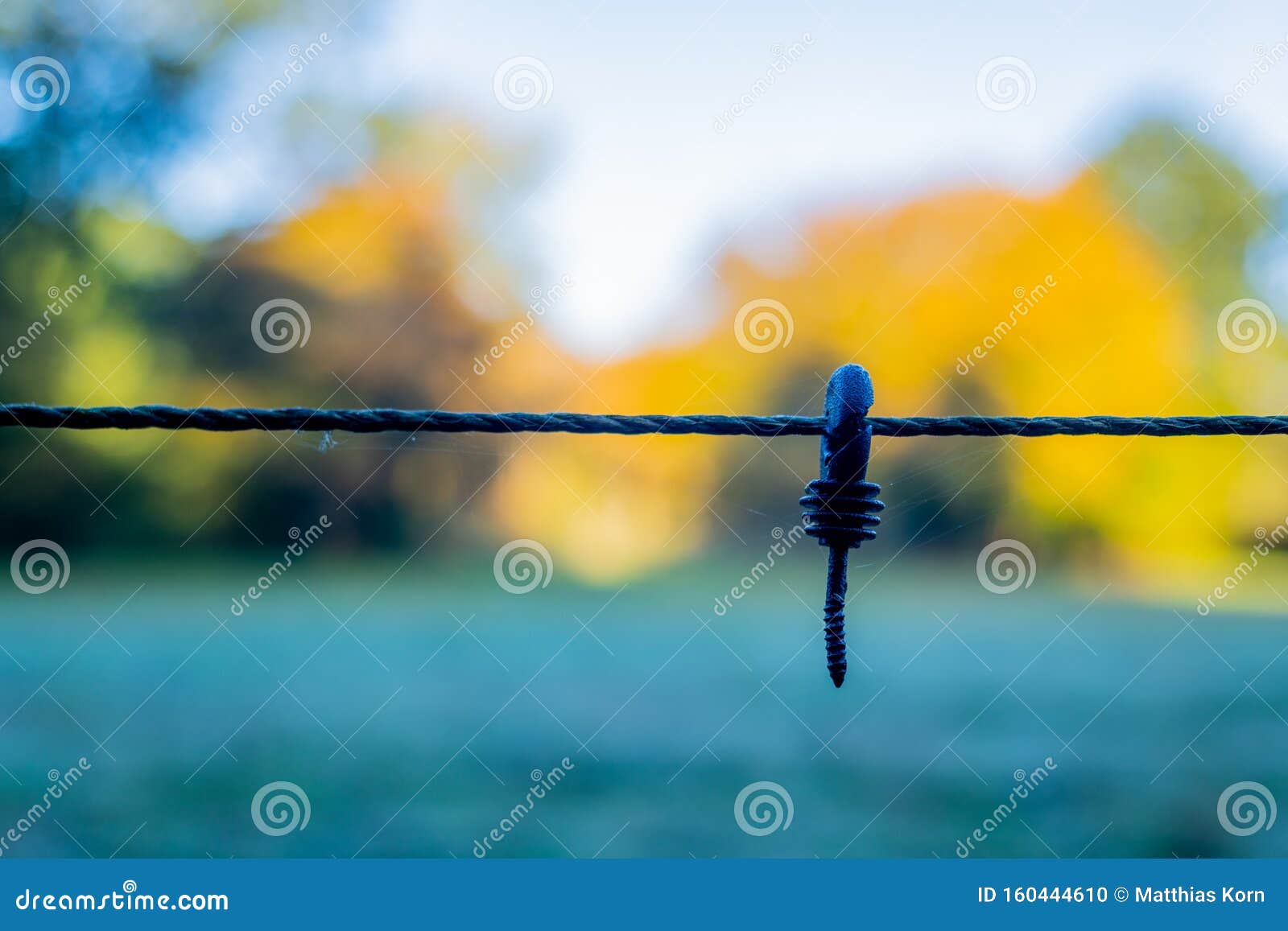 A Torn Hack from a Fence is Hanging on the Chain Link Fence Stock Photo ...