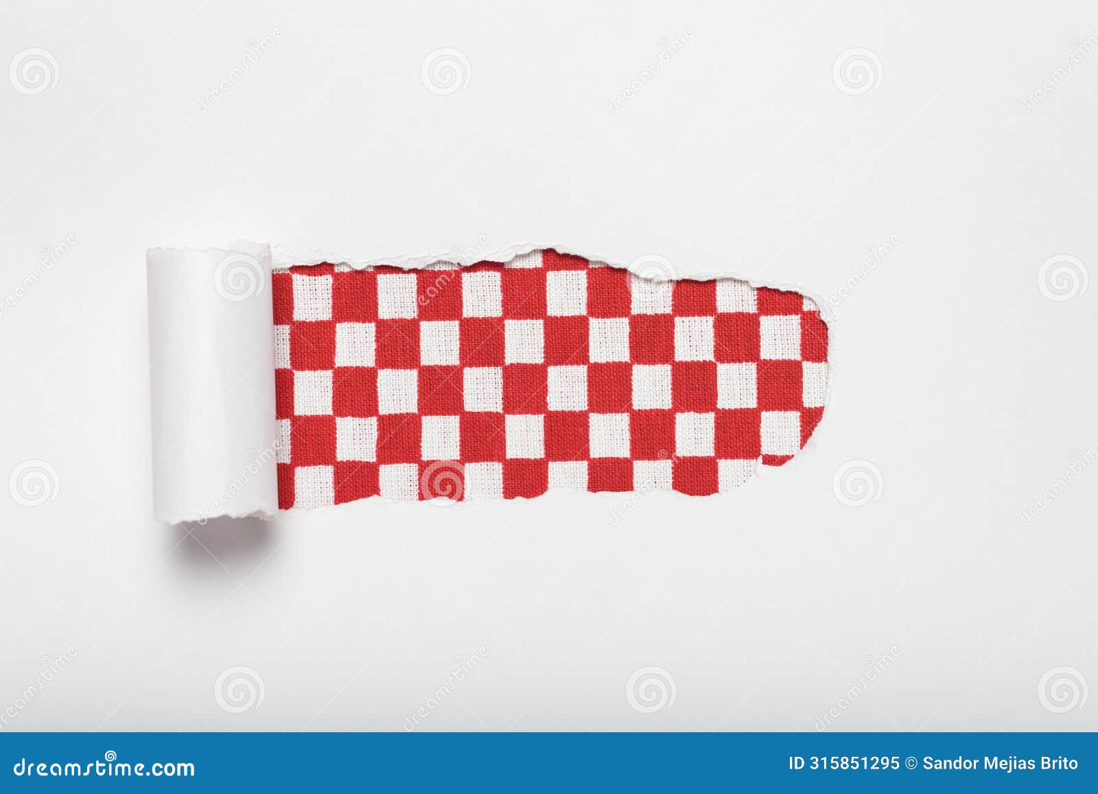 Torn Hole in White Paper Revealing Red and White Checkered Textile ...