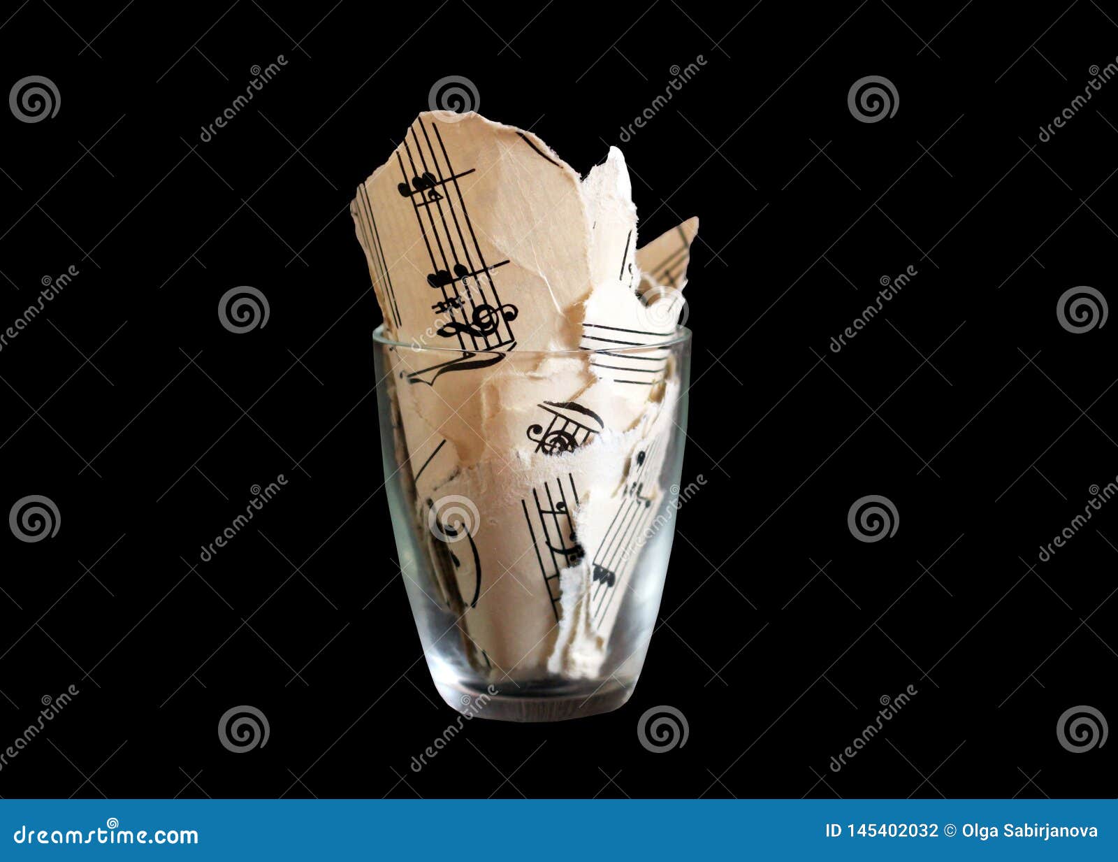 Torn Musical Notes in a Glass, Pieces of Paper, Isolated on Black Stock ...